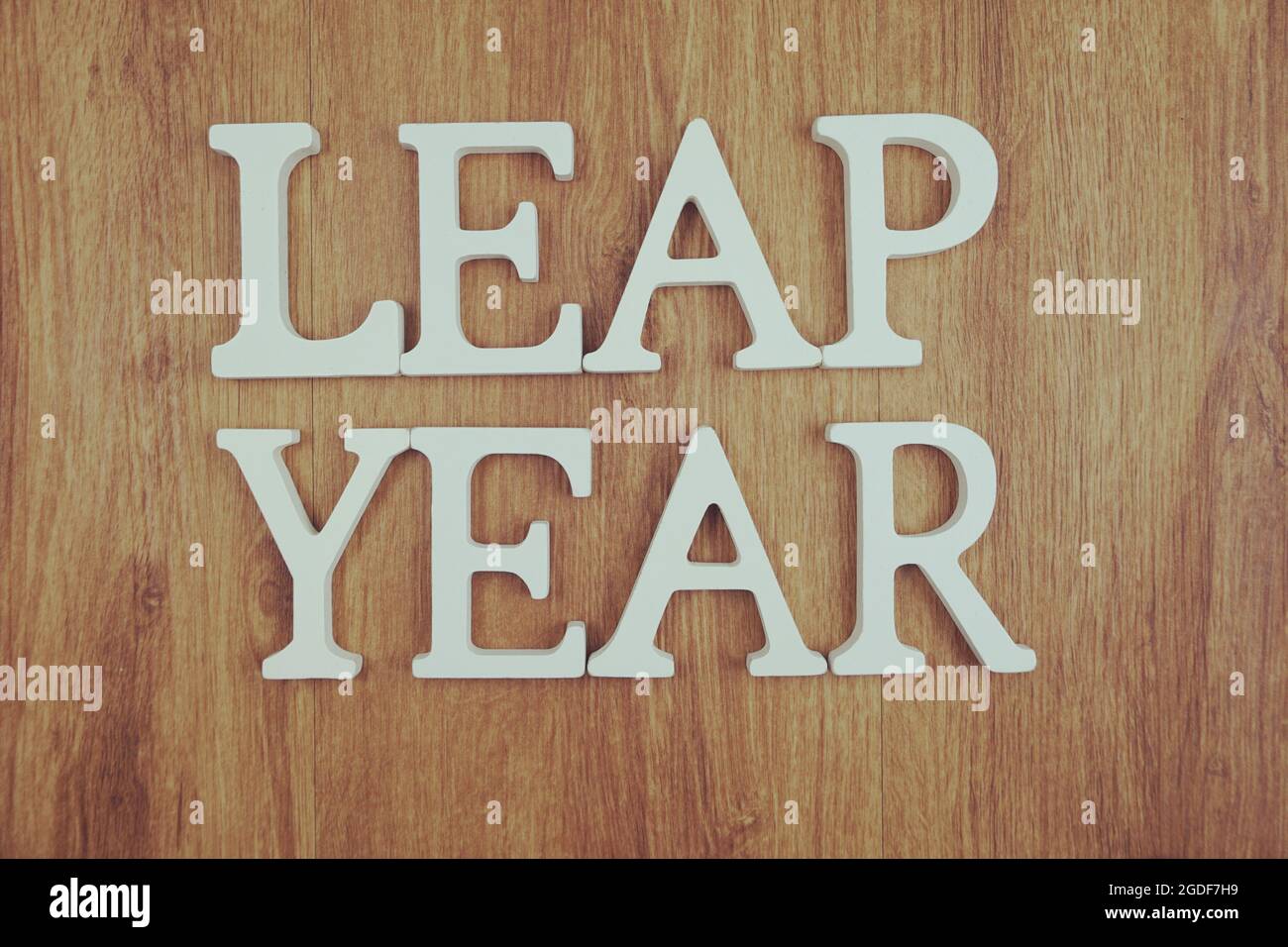 Leap Year alphabet letters on wooden background Stock Photo - Alamy