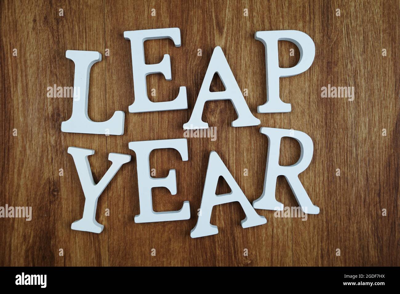 Leap Year alphabet letters on wooden background Stock Photo - Alamy