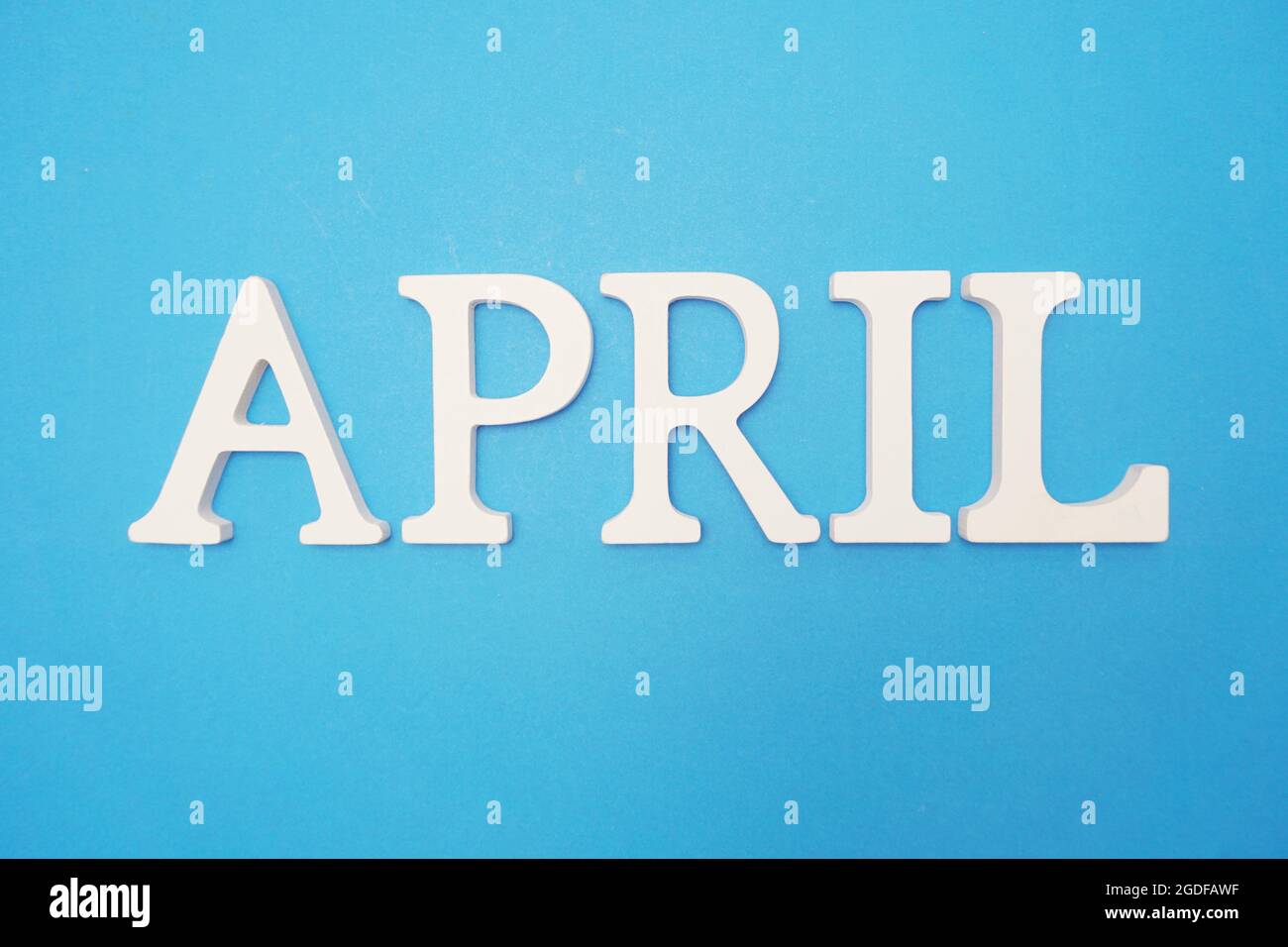 April alphabet letter with space copy on blue background Stock Photo ...