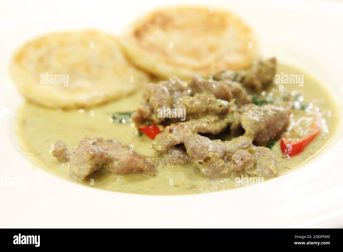 Roti with beef green curry Stock Photo - Alamy