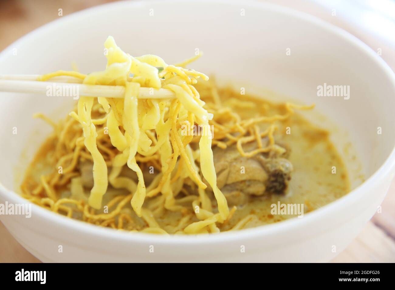 Northern Thai Noodle Khao soy in wood Stock Photo - Alamy