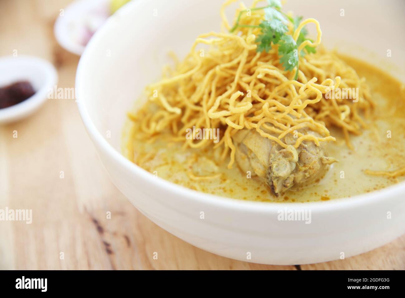 Northern Thai Noodle Khao soy in wood Stock Photo - Alamy