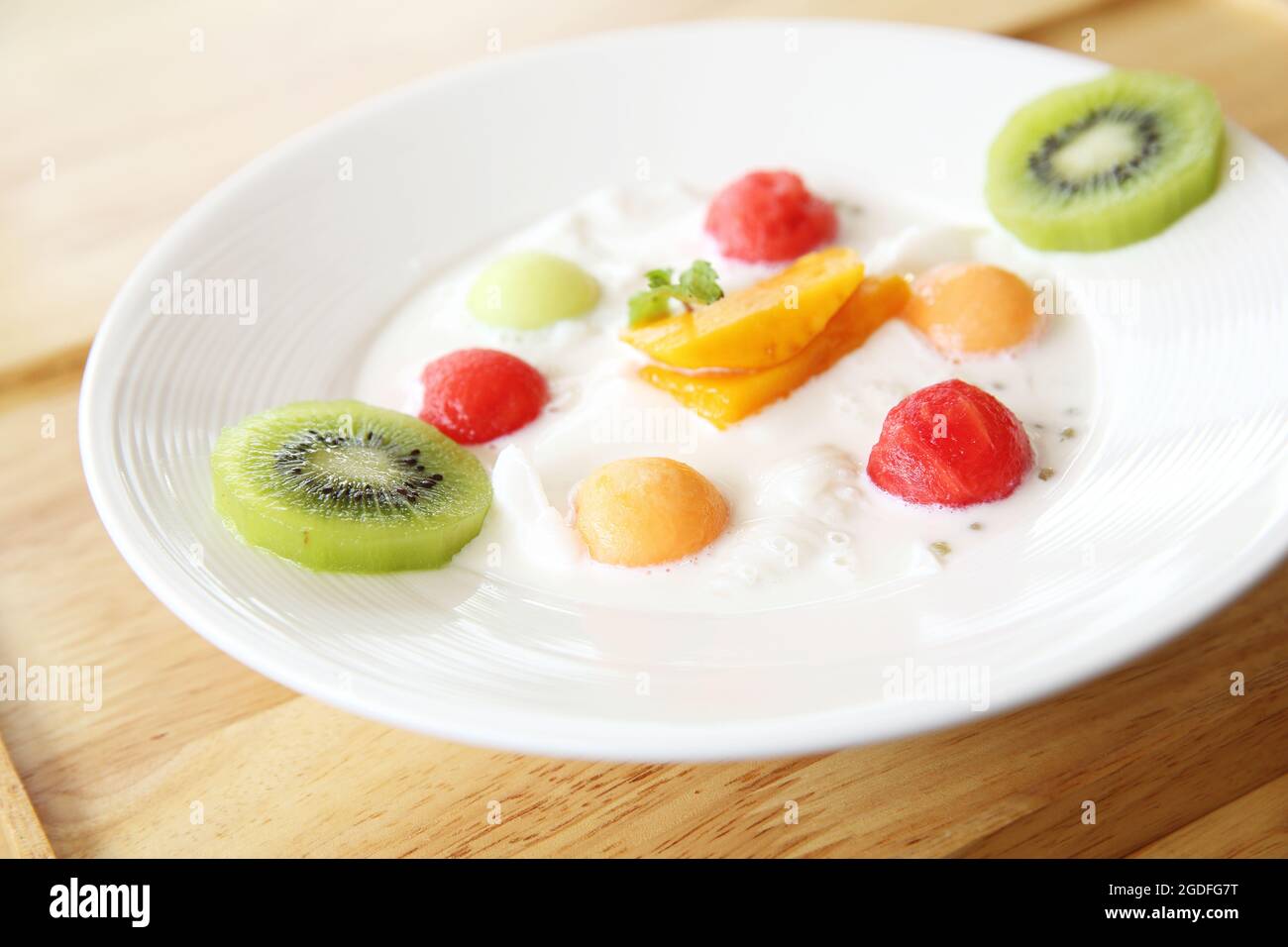 Fruit pudding on wood background Stock Photo - Alamy