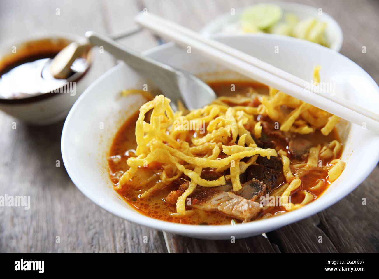 Northern Thai Noodle Khao soy in wood Stock Photo - Alamy