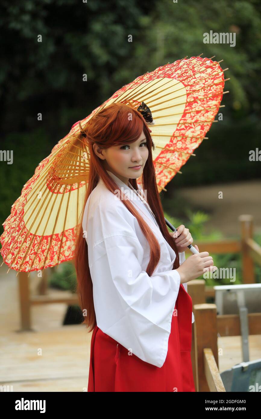 Asian girl portrait , Japanese Miko in nature Stock Photo - Alamy