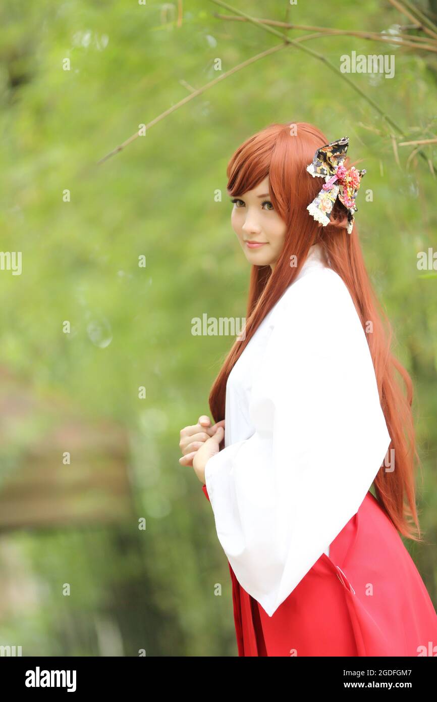 Asian girl portrait , Japanese Miko in nature Stock Photo - Alamy