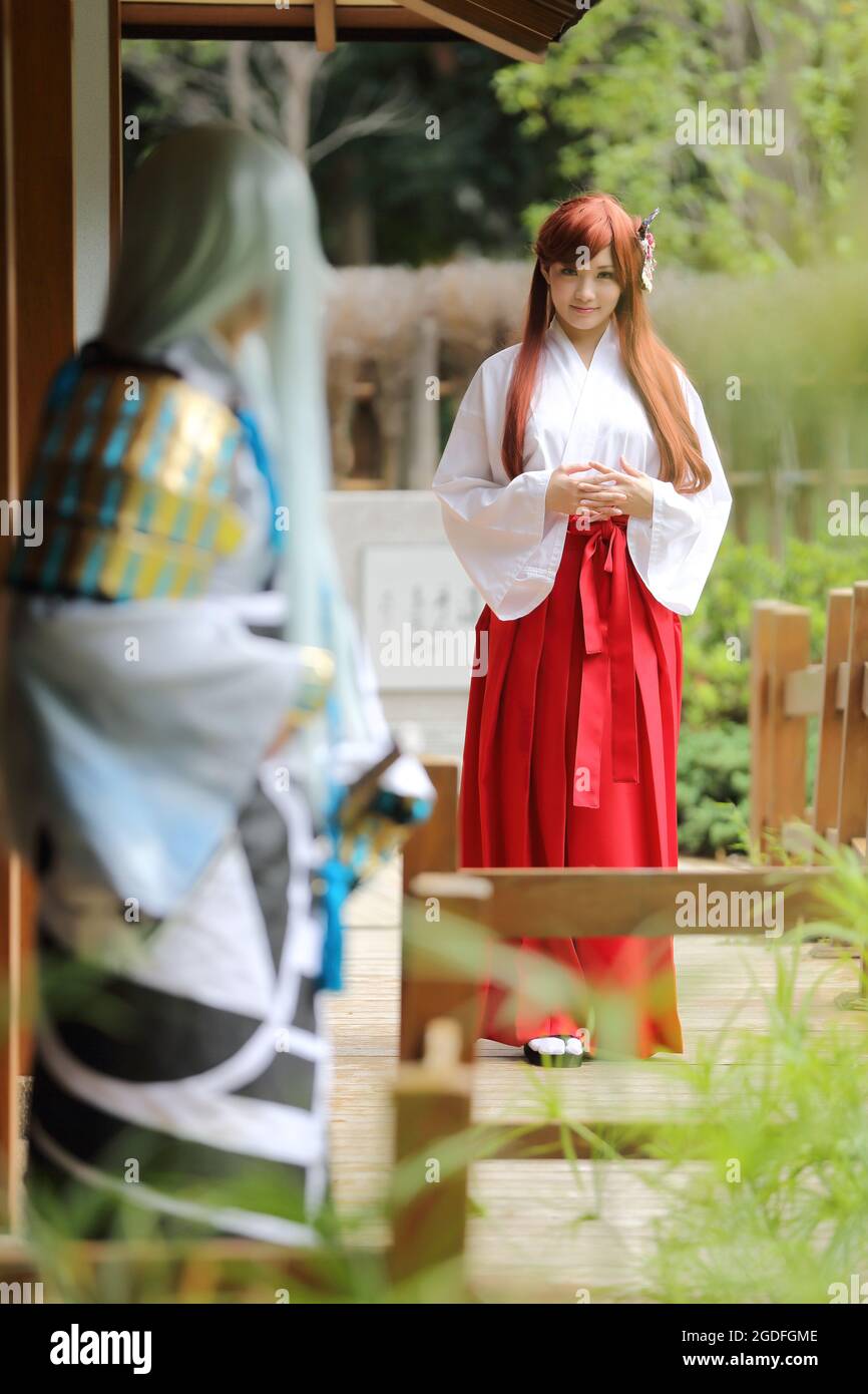 Asian girl portrait , Japanese Miko in nature with samurai cosplay ...