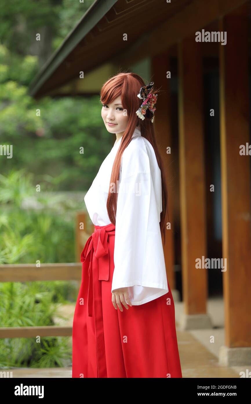 Asian girl portrait , Japanese Miko in nature Stock Photo - Alamy