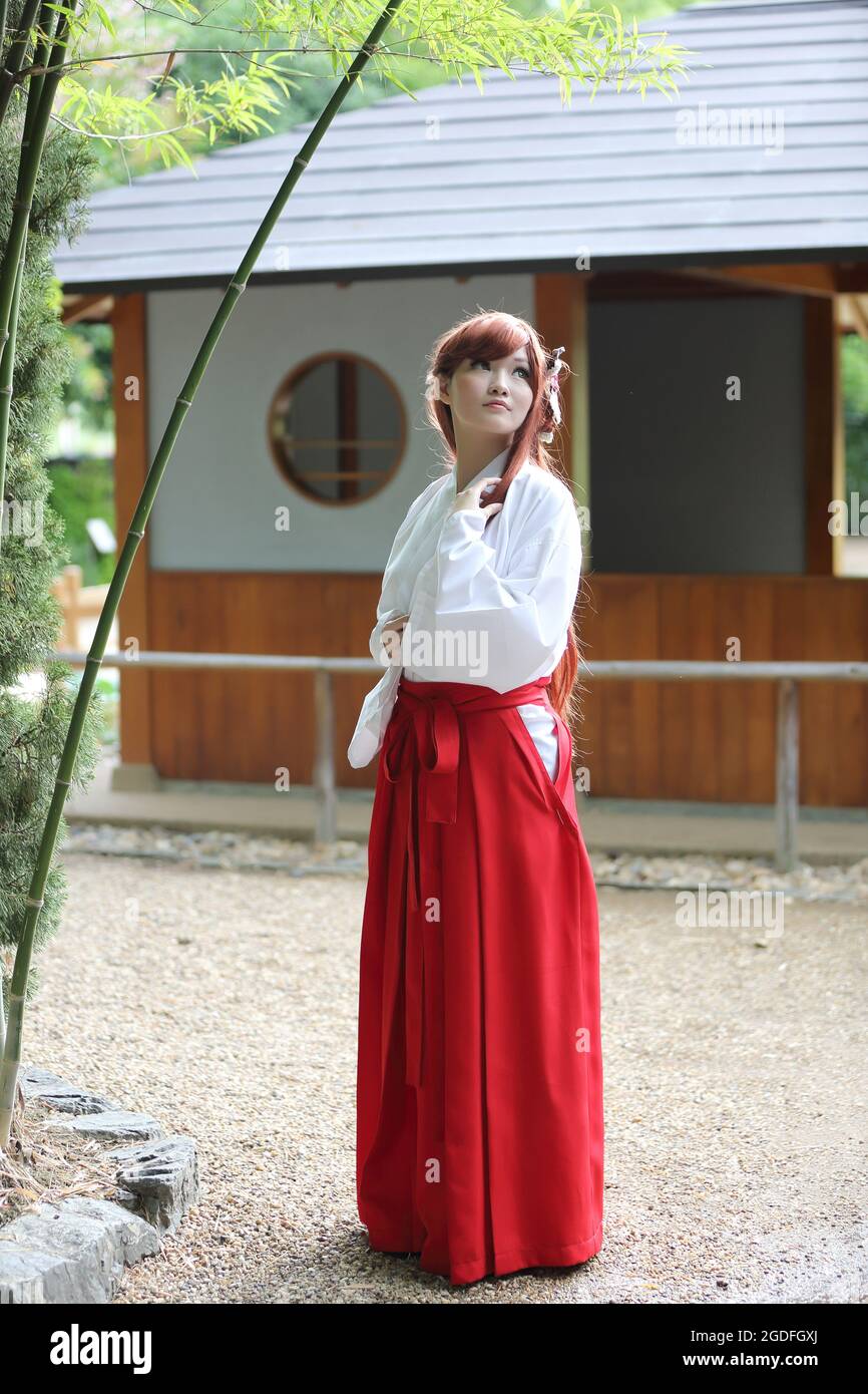 Asian girl portrait , Japanese Miko in nature Stock Photo - Alamy