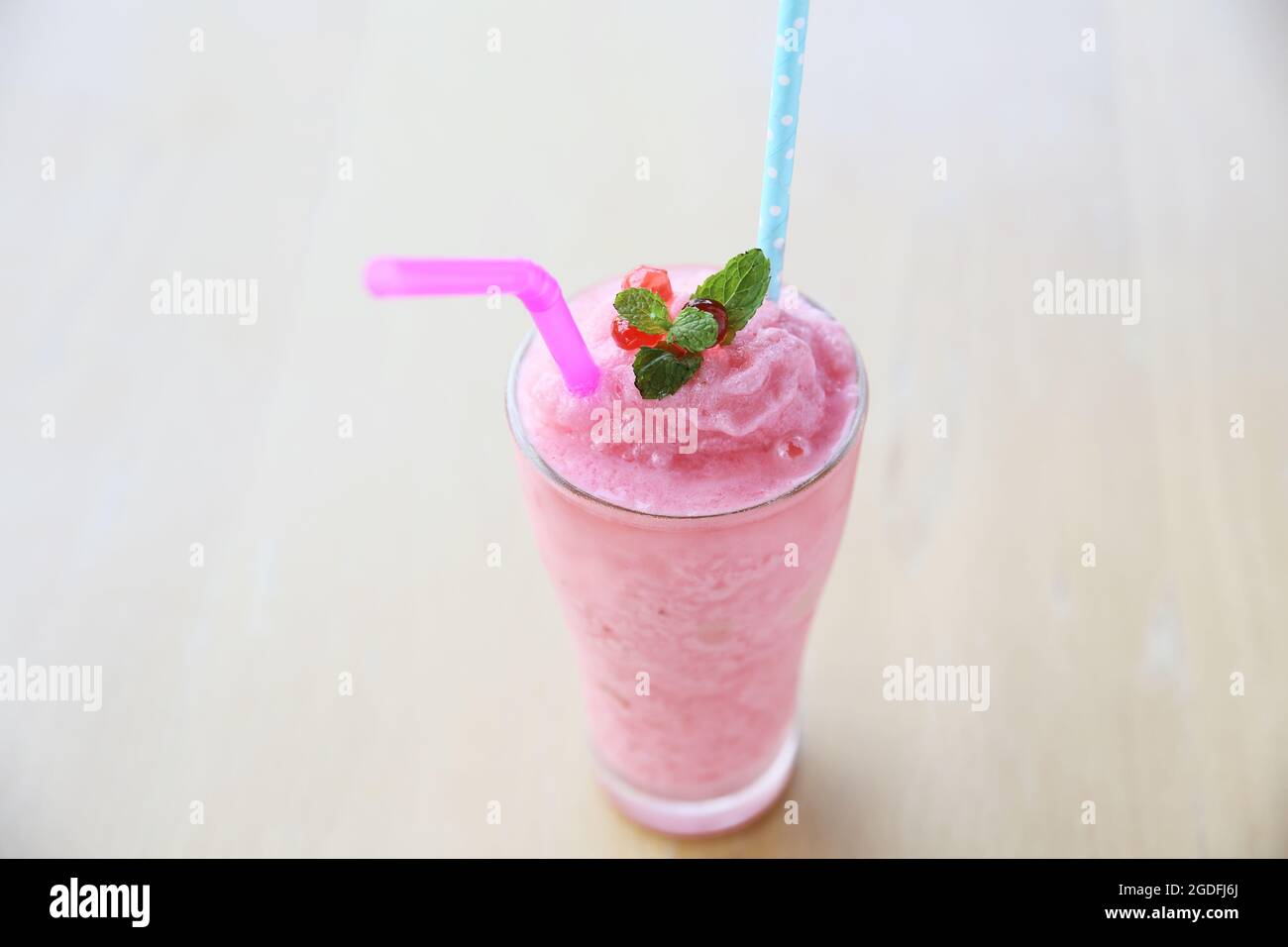 strawberry milk shake on wood background Stock Photo - Alamy