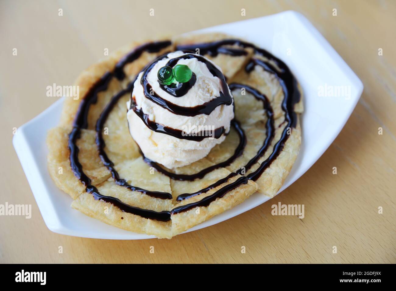 roti with milk on wood background Stock Photo - Alamy