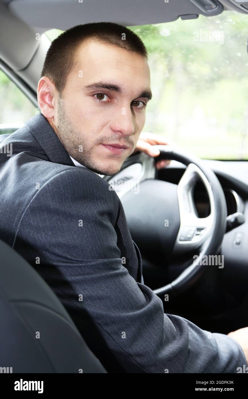 Man driving car Stock Photo - Alamy