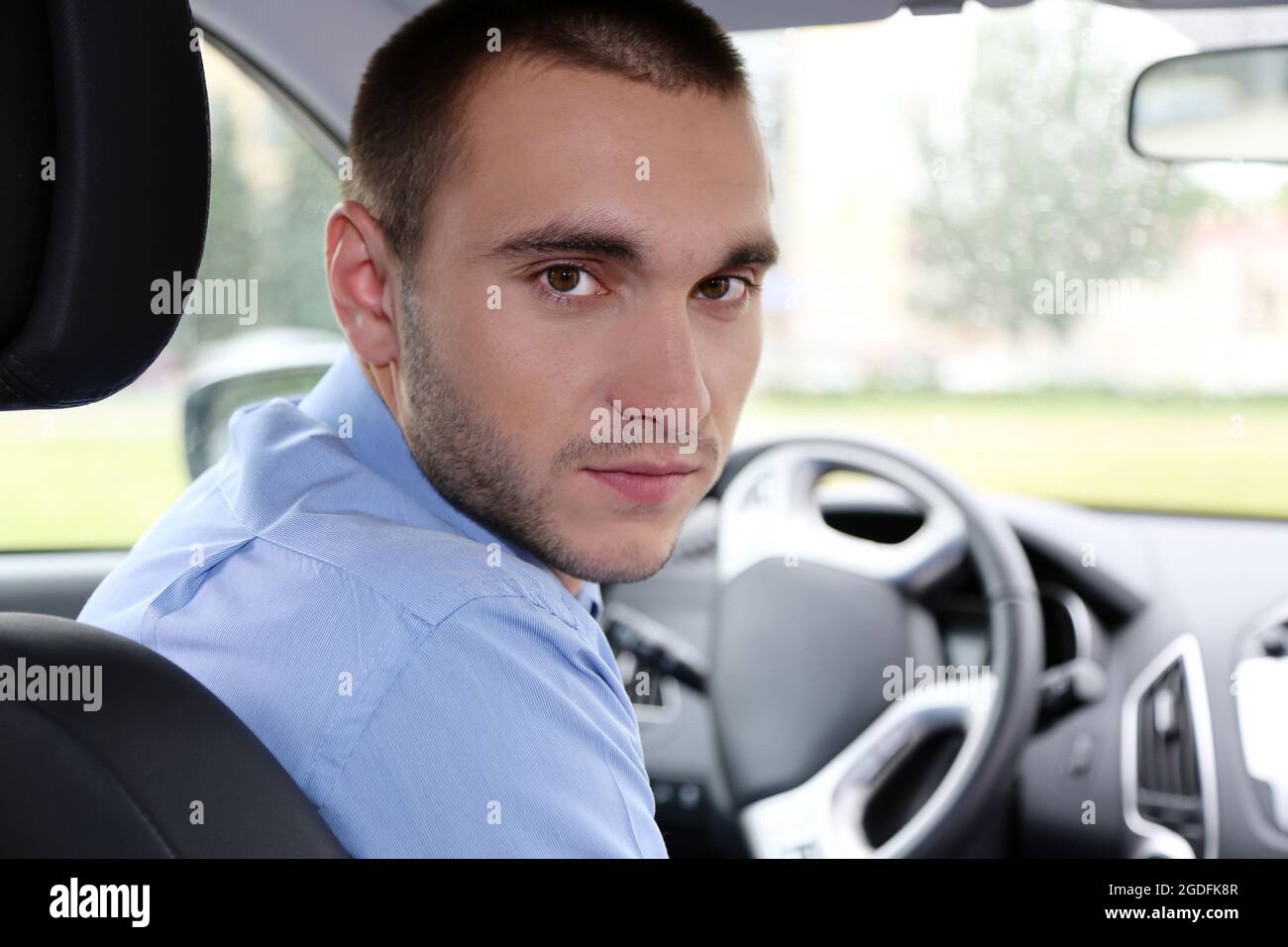Man driving car Stock Photo - Alamy