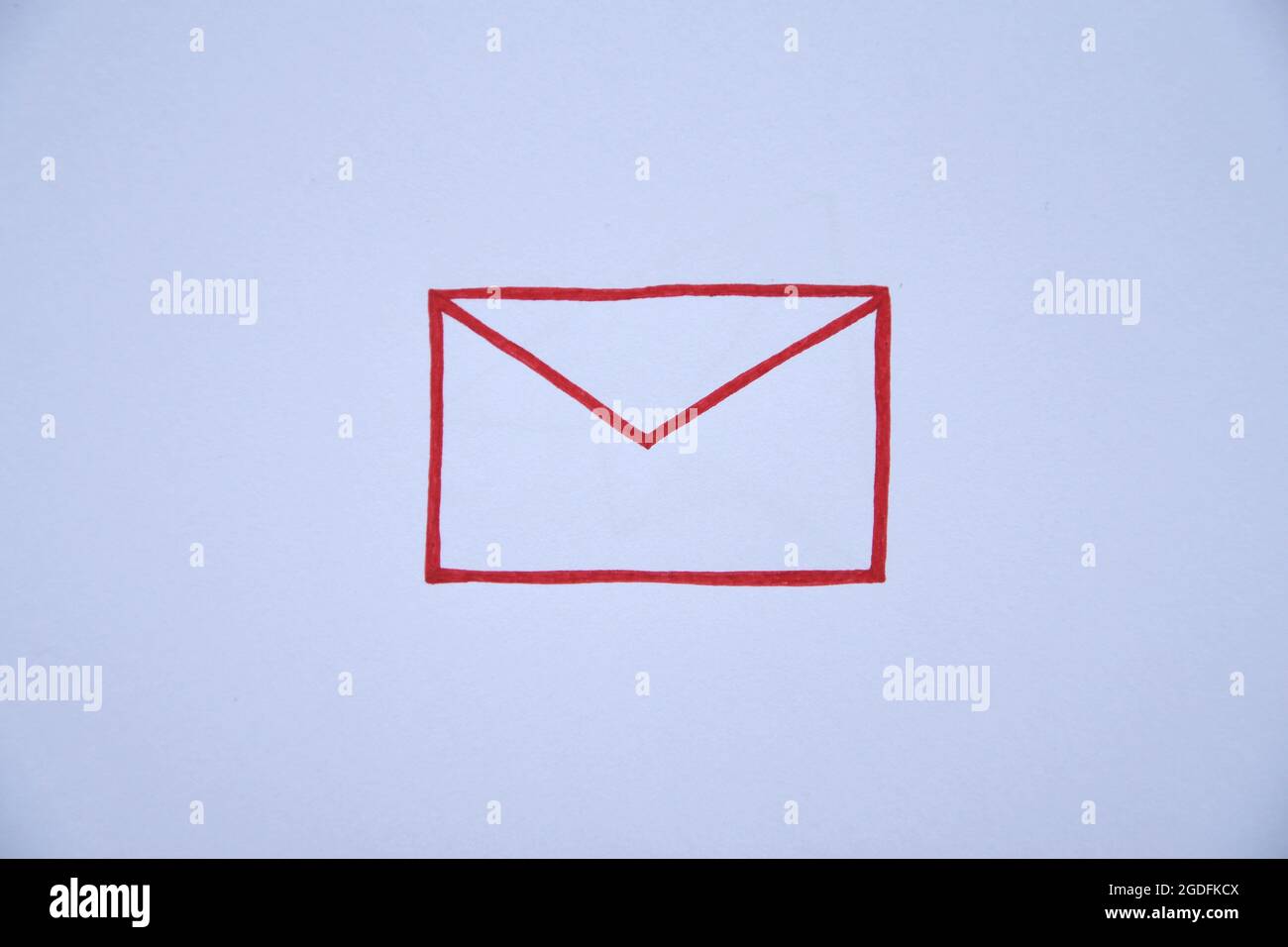 Photo of a drawing of red letter on white paper Stock Photo - Alamy