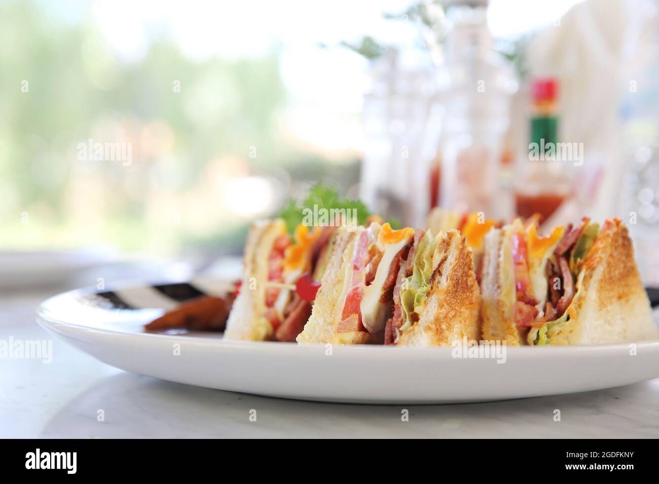 breakfast Club sandwich with chips Stock Photo - Alamy