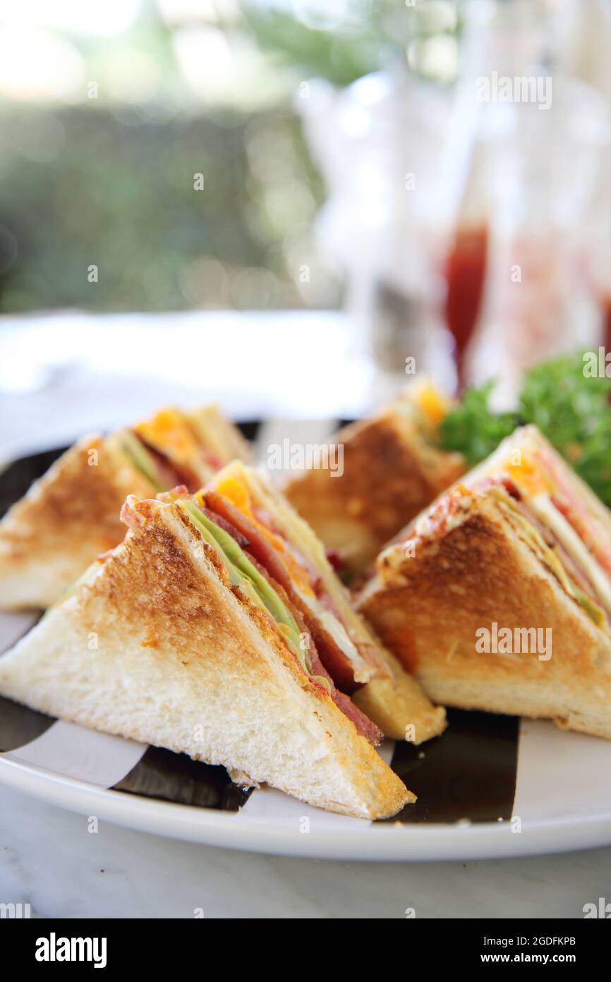 breakfast Club sandwich with chips Stock Photo - Alamy