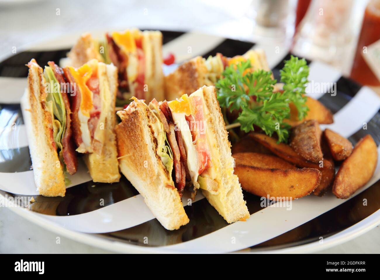 breakfast Club sandwich with chips Stock Photo - Alamy