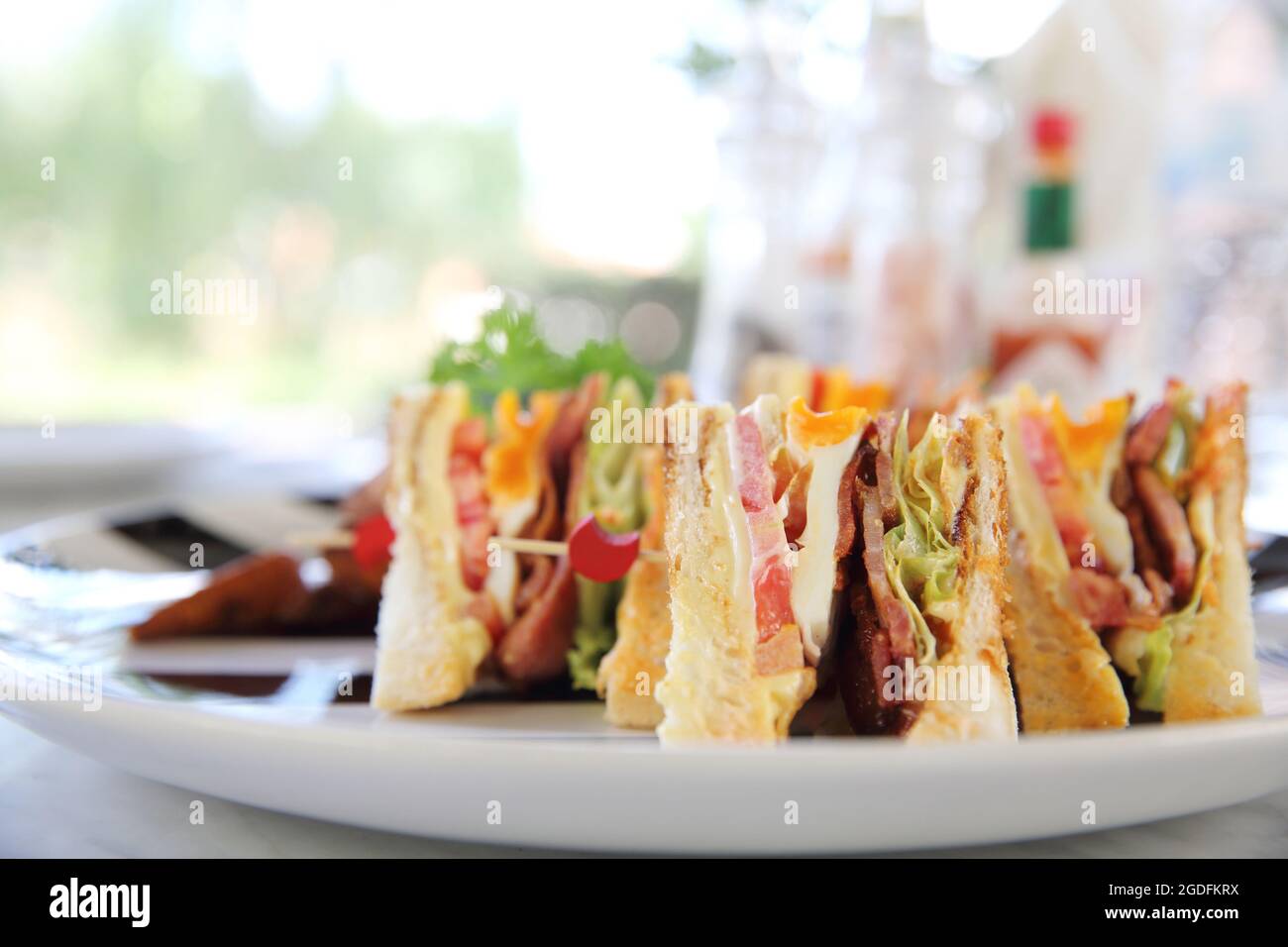breakfast Club sandwich with chips Stock Photo - Alamy