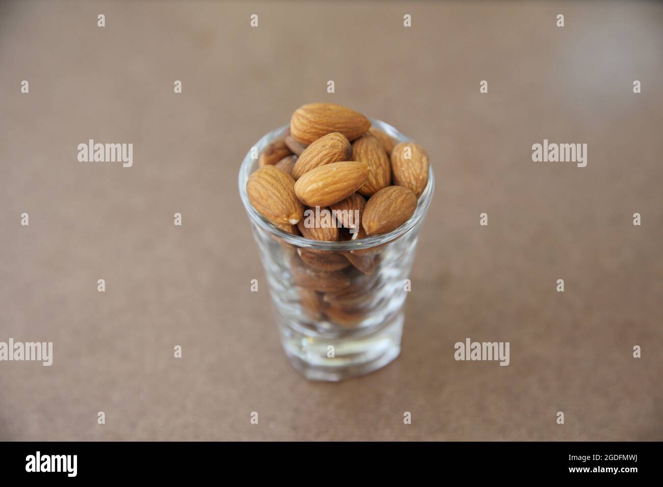 Almonds background full frame hi-res stock photography and images - Alamy