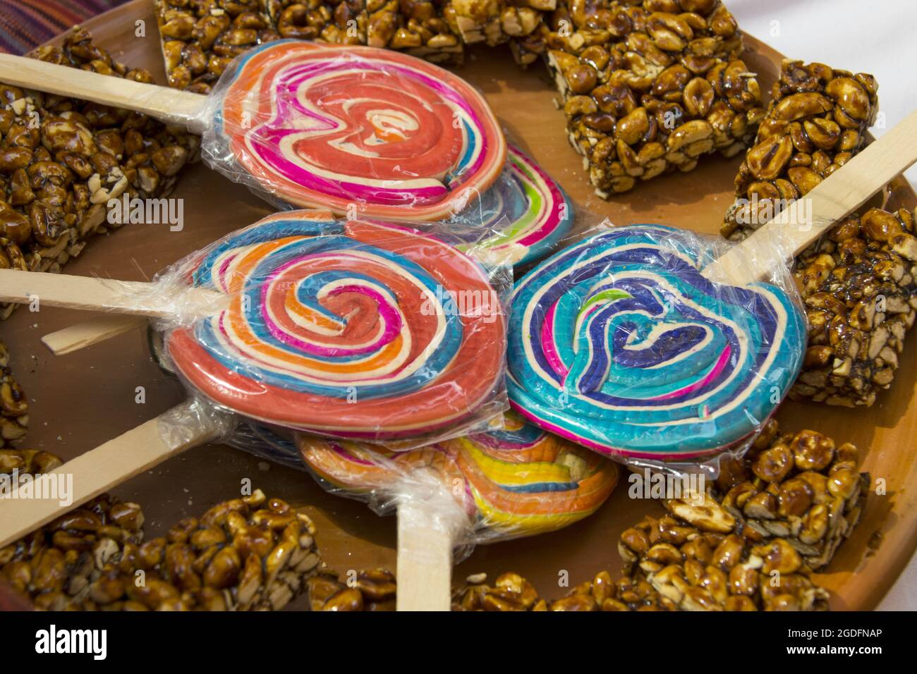 coconut cookie and canillita of milk typical candy Stock Photo - Alamy