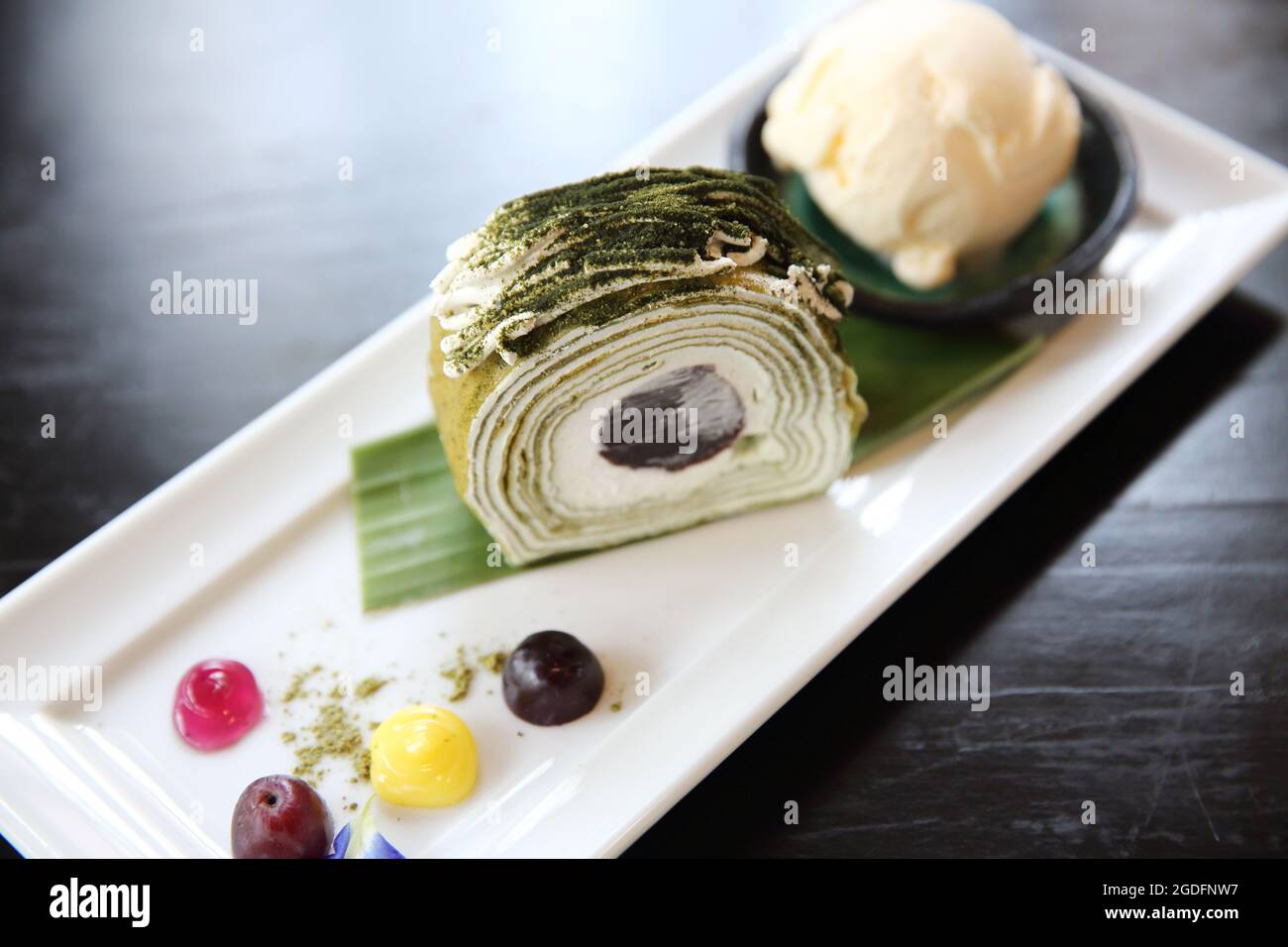 green tea roll cake with ice cream Stock Photo - Alamy