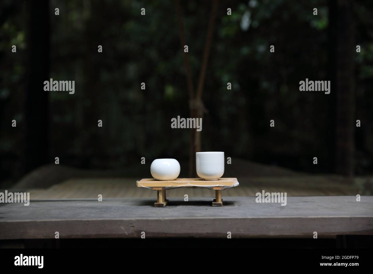 japanese sake on wood in forest Japanese temple Stock Photo - Alamy