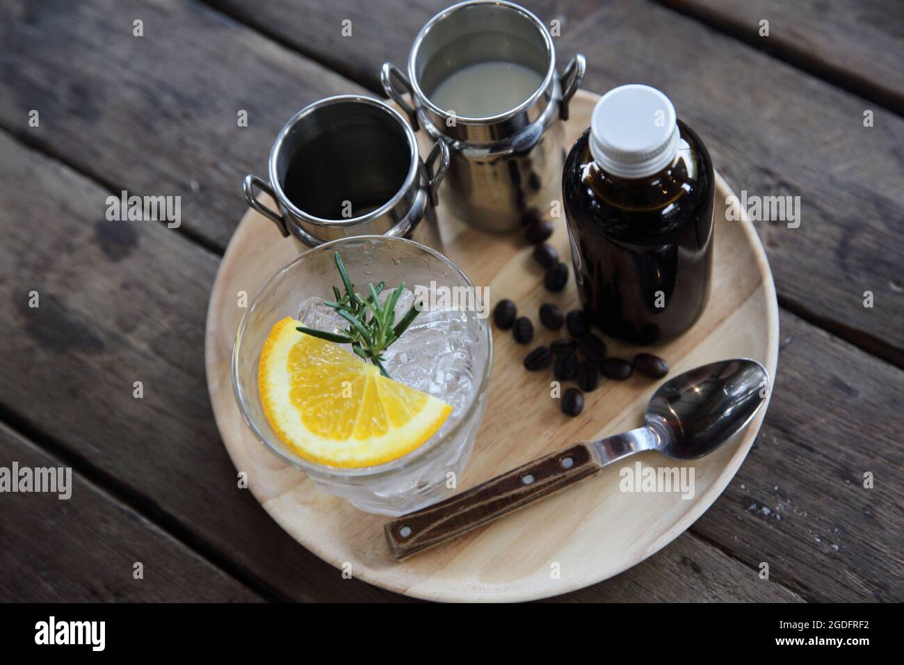 Coffee and orange mix on wood background Stock Photo - Alamy