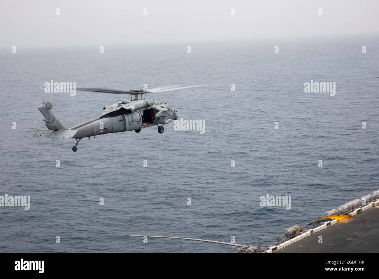 210810-N-OJ308-1108 GULF OF OMAN (Aug. 11, 2021) A MH-60S Sea Hawk ...