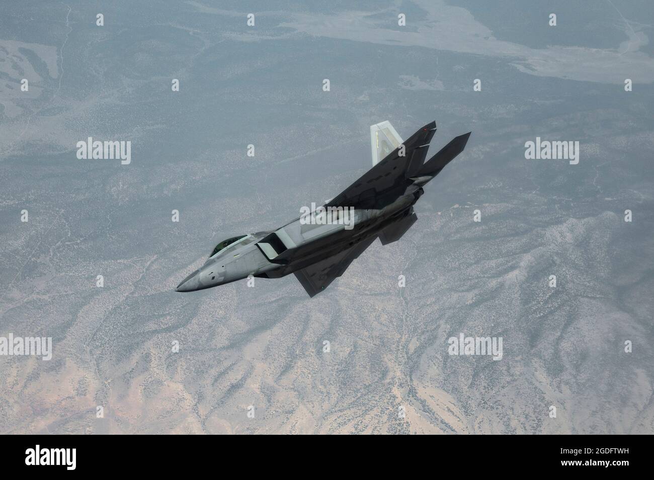 An F-22 Raptor assigned to assigned to the 27th Fighter Squadron from ...