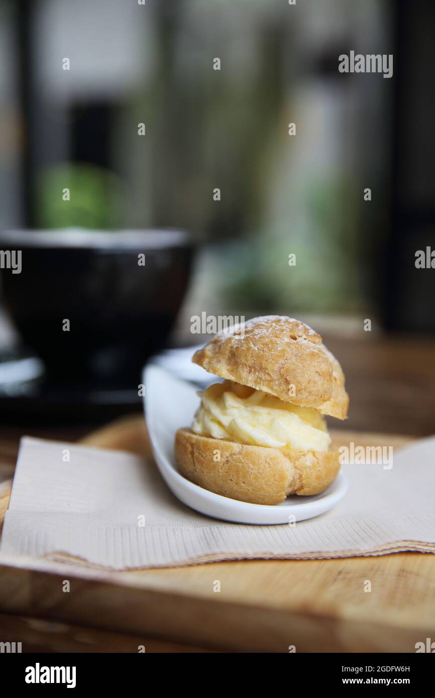 Cream puff choux cream in close up Stock Photo - Alamy