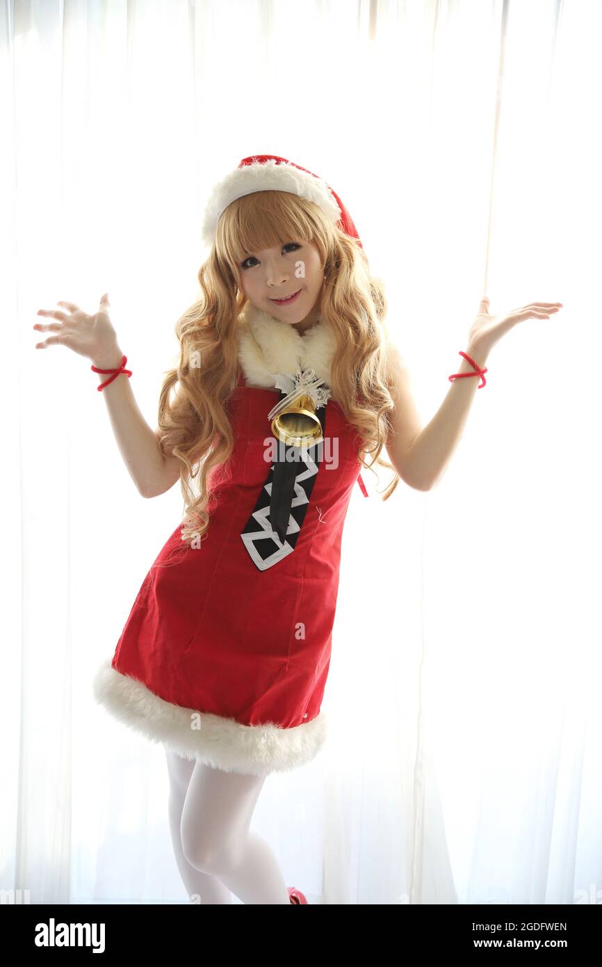 Christmas asian woman portrait with christmas gift Stock Photo - Alamy