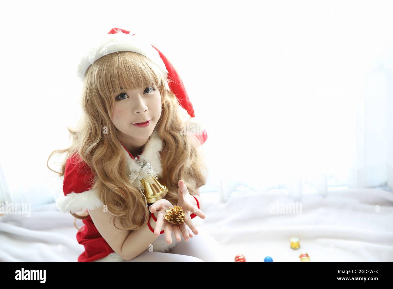 Christmas asian woman portrait with christmas gift Stock Photo - Alamy