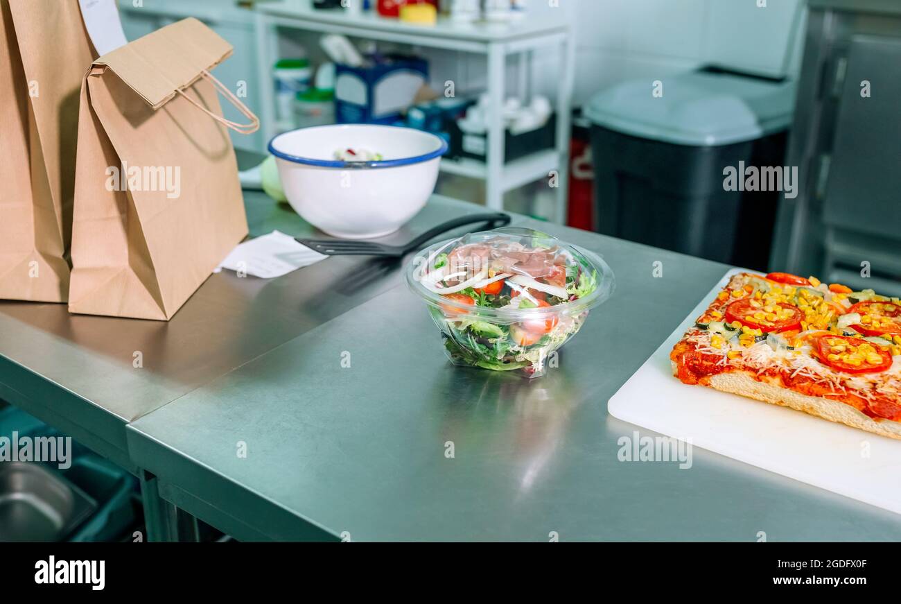 Ordering food in a restaurant kitchen Stock Photo - Alamy
