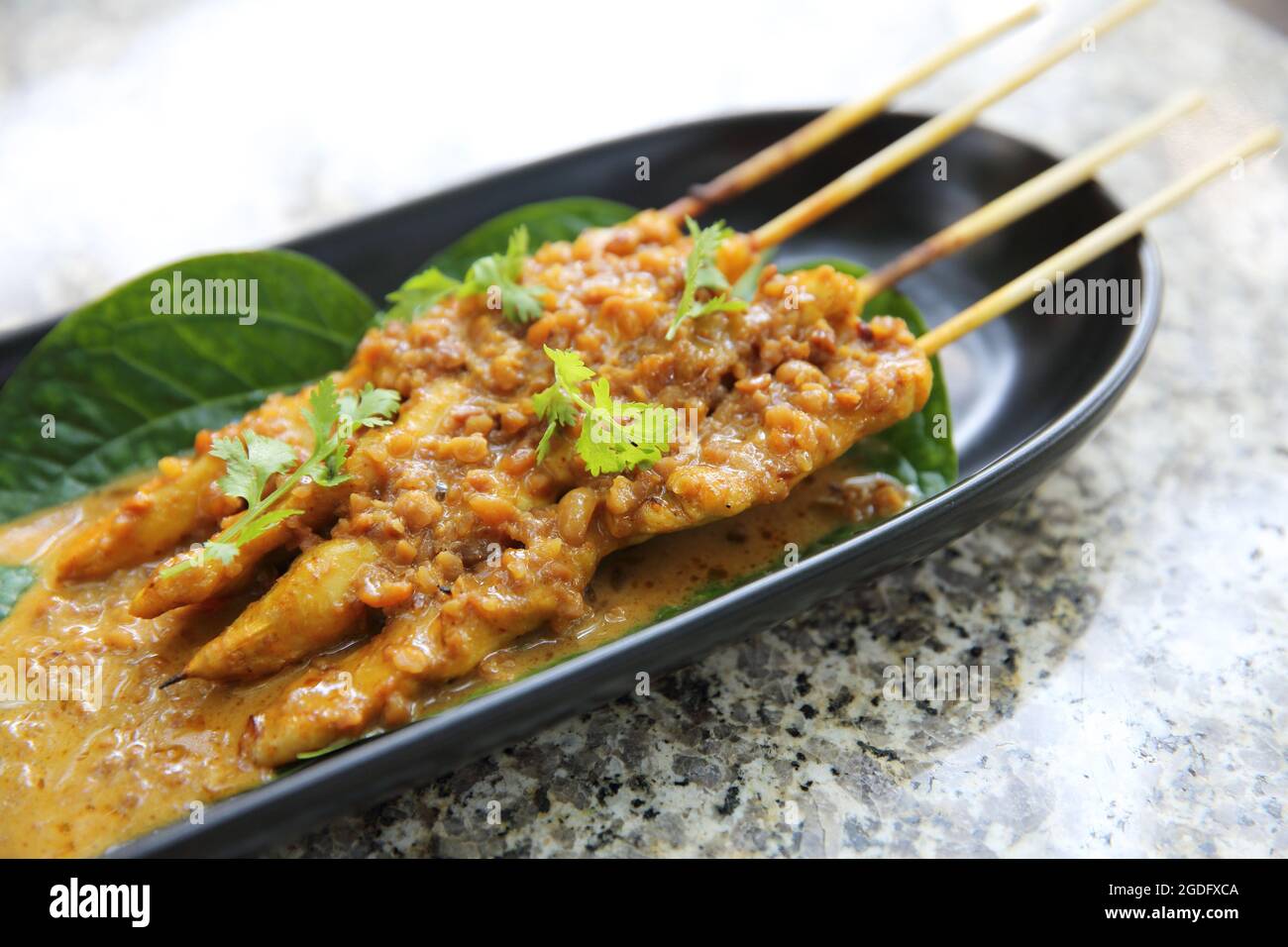 Chicken Satay in close up , Asian food Stock Photo - Alamy