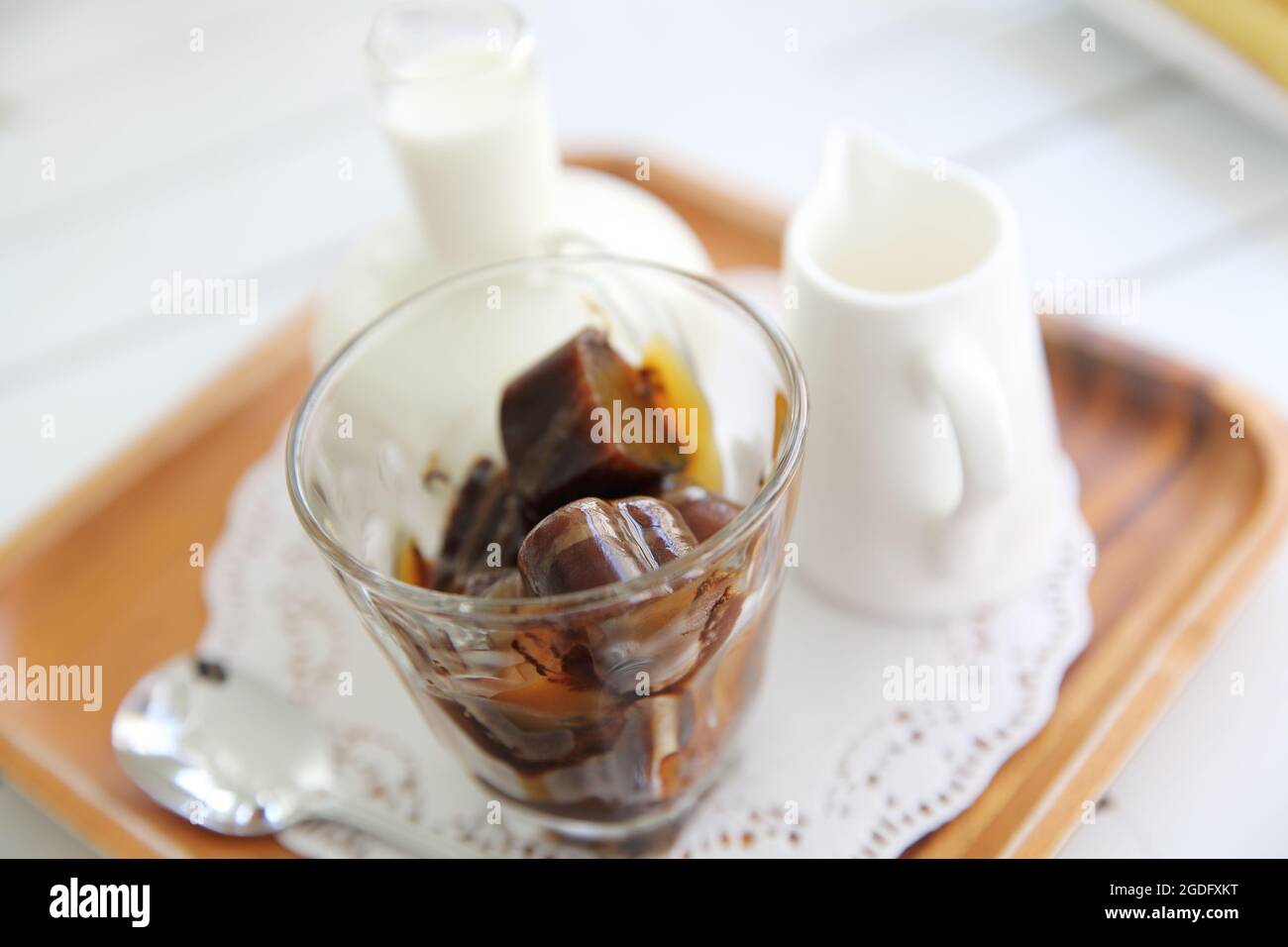iced coffee on white wood background Stock Photo - Alamy