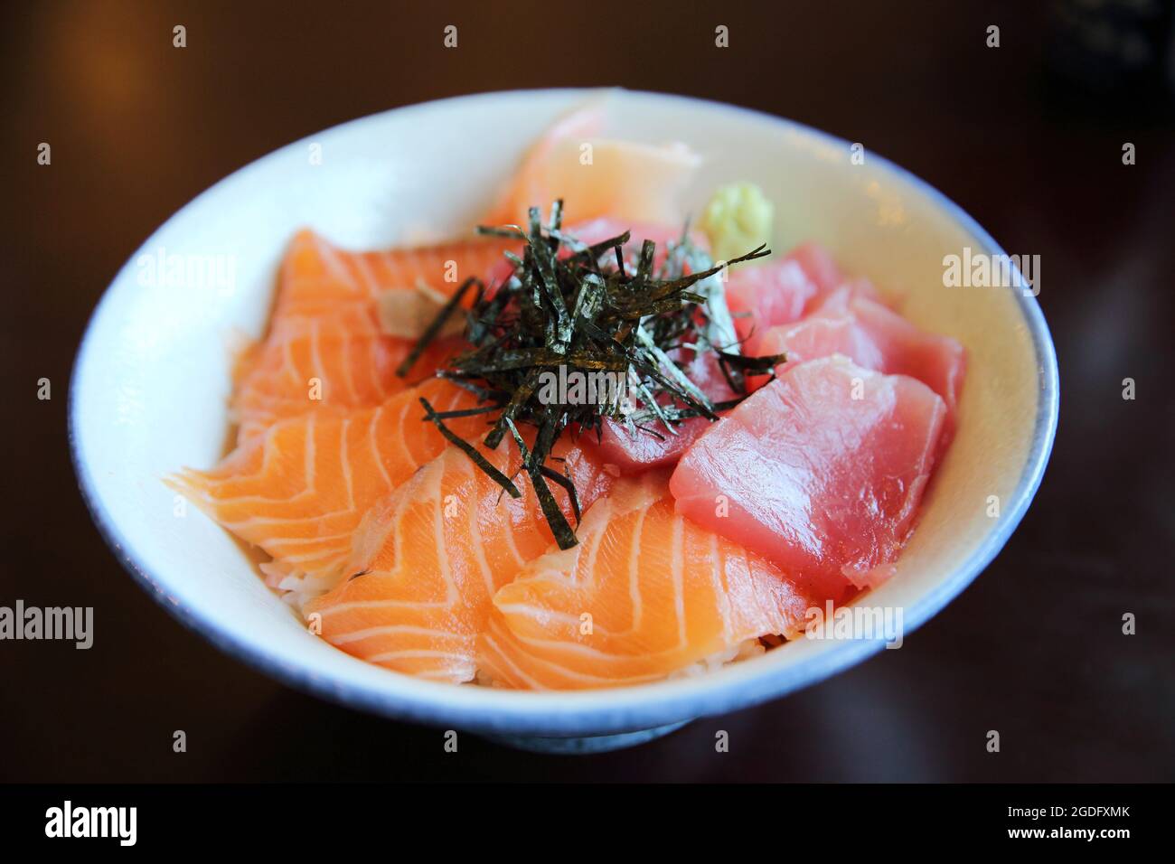 Salmon and tuna sushi don Stock Photo - Alamy