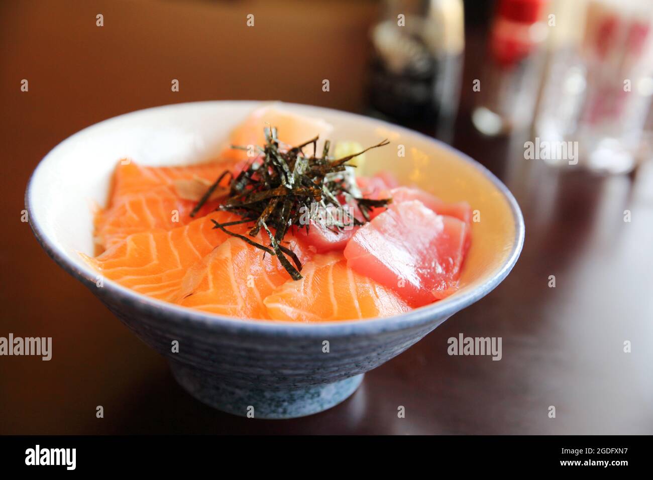 Salmon and tuna sushi don Stock Photo - Alamy
