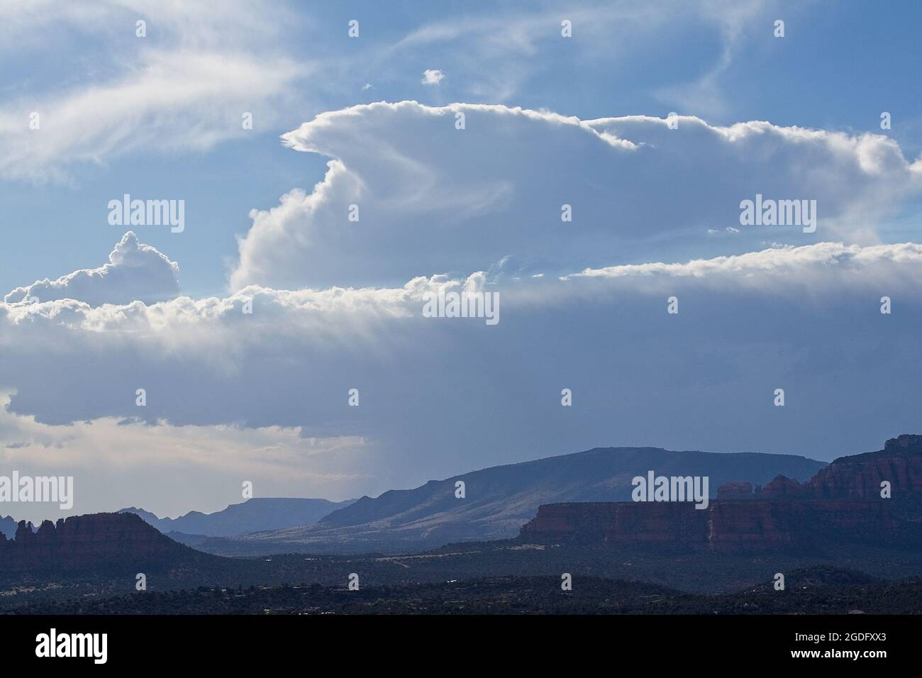 Fire in the distance in Oak Creek Canyon, Arizona during daylight Stock ...