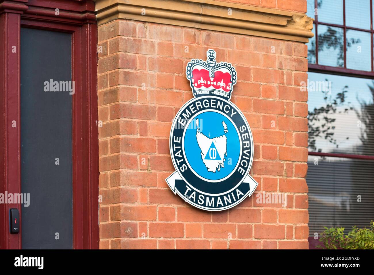 The State Emergency Service (SES) emblem on a building in Hobart ...