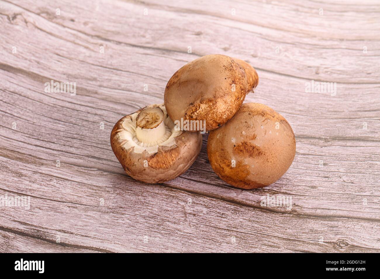 Raw brown champignons mushroom heap for cooking Stock Photo - Alamy