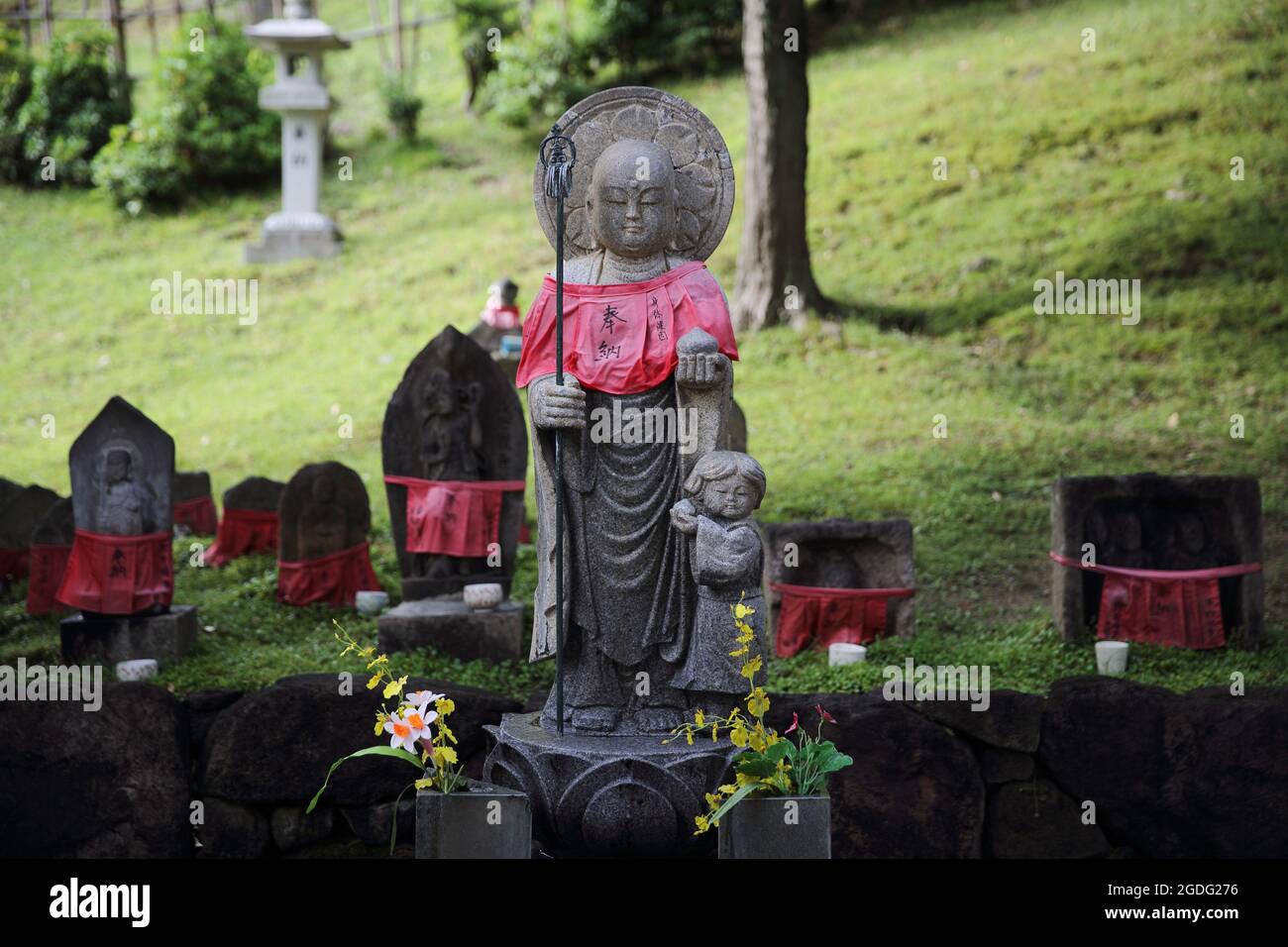 Small stone buddha monk statue call jizo in Japanese Stock Photo - Alamy
