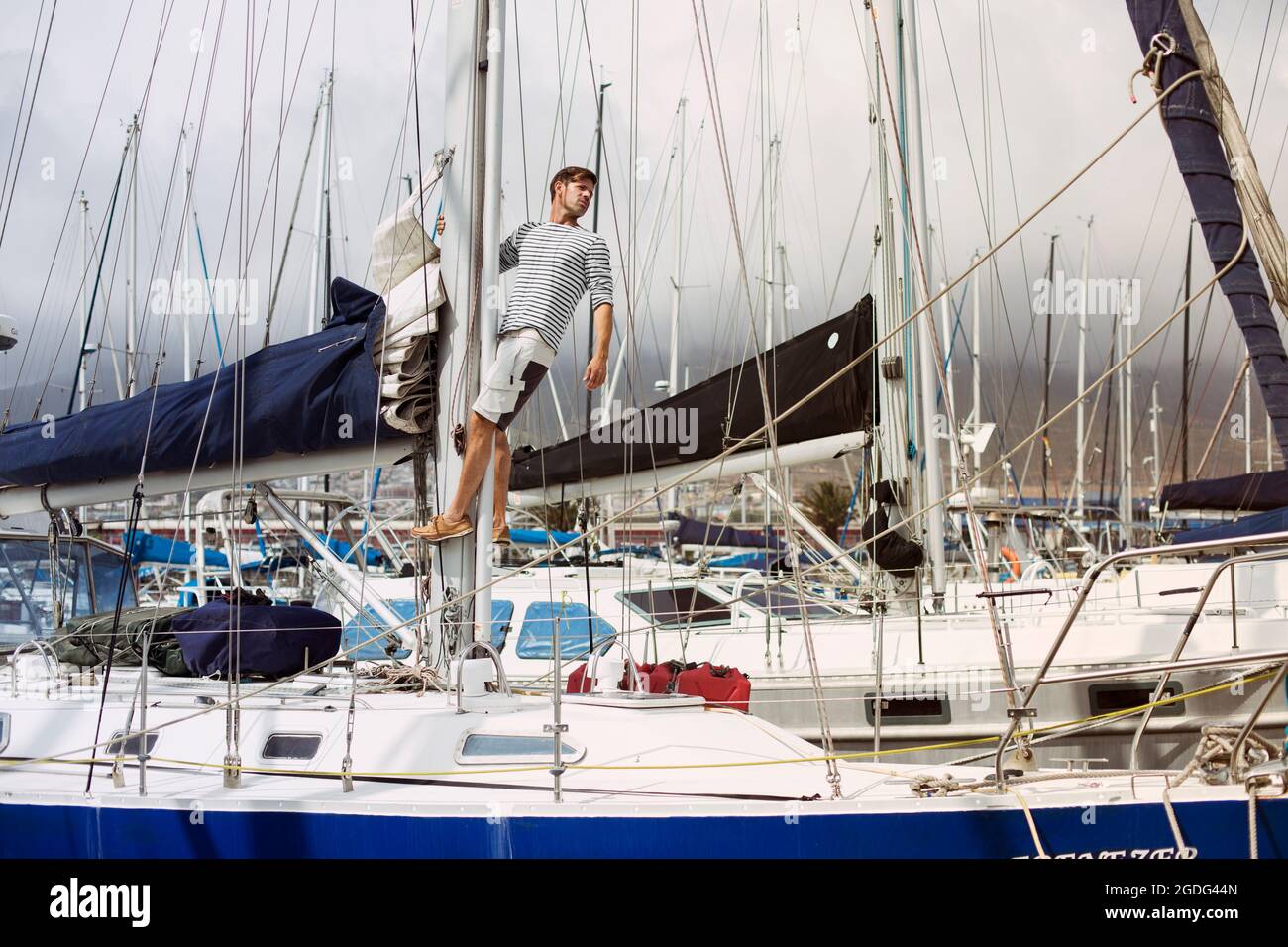 Man on sailboat, Cape Town, Western Cape, South Africa Stock Photo - Alamy