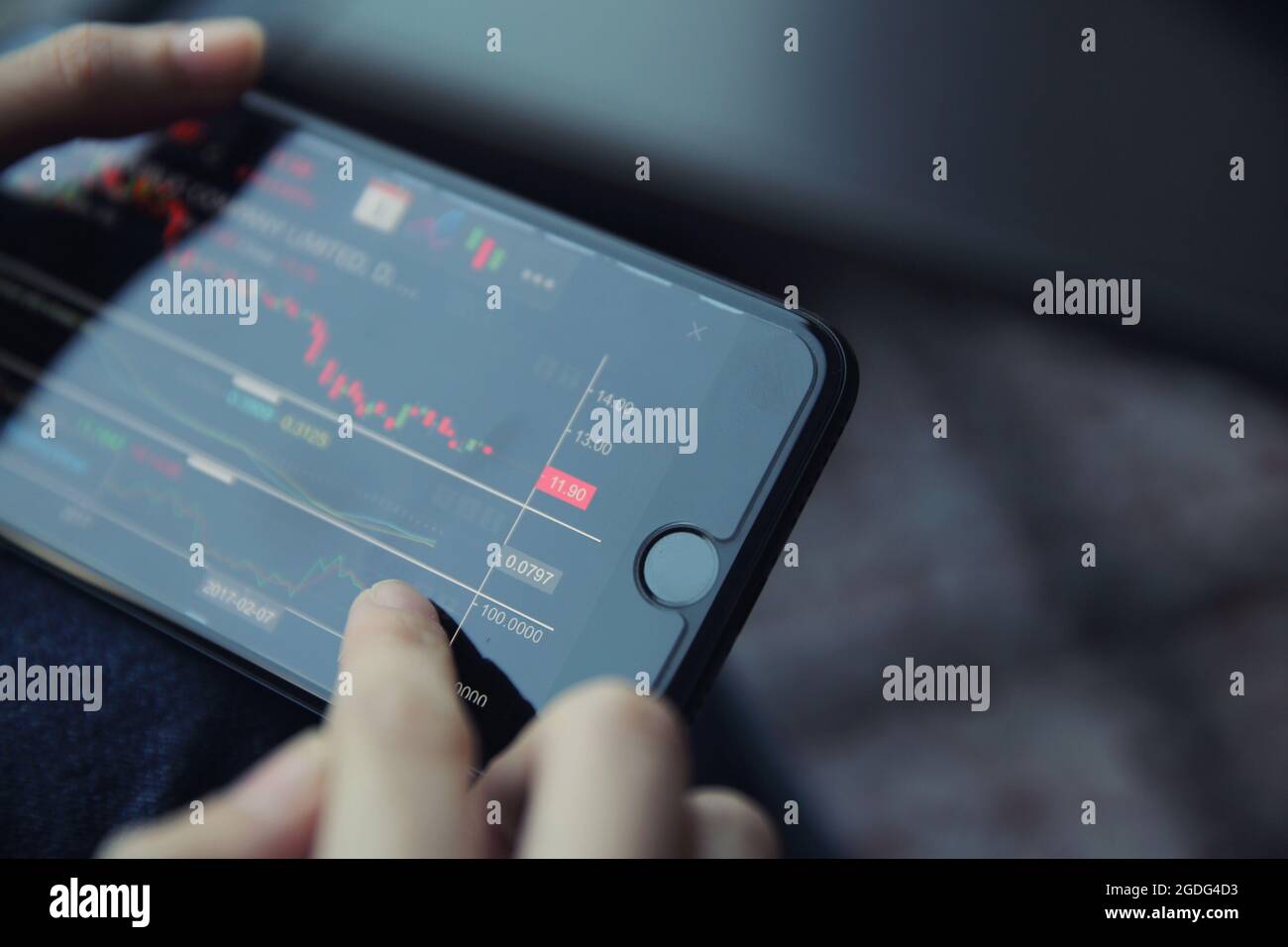 trading online on smartphone with business woman hand Stock Photo - Alamy
