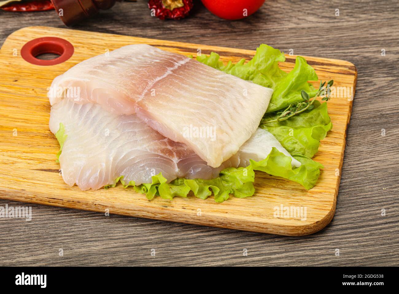 Raw pangasius fillet fish for cooking Stock Photo - Alamy