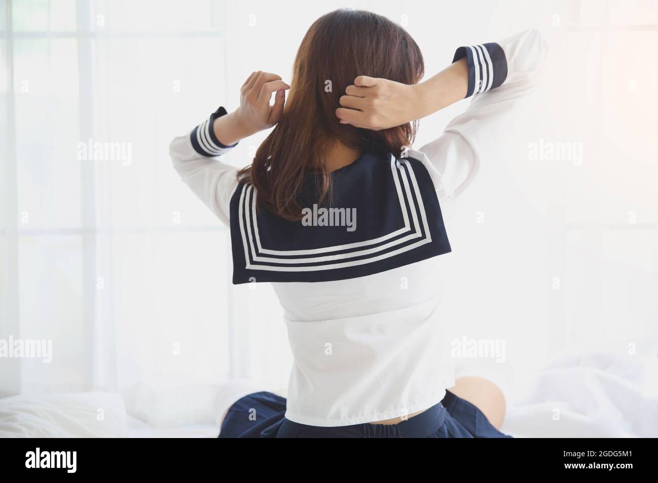 One asian school girl dressing up in white tone and flare Stock Photo ...