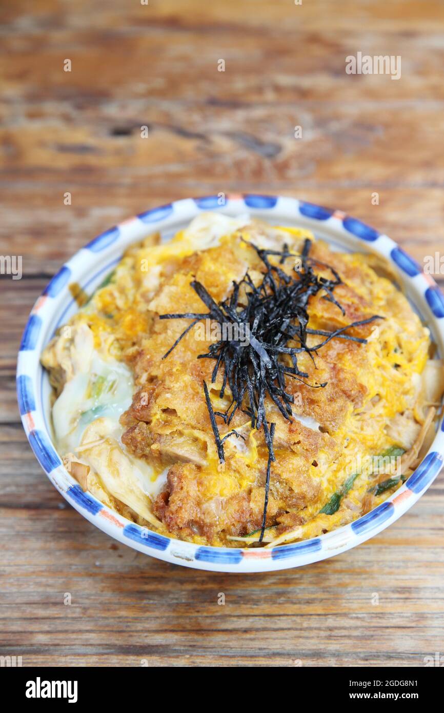 Katsudon deep fried pork cutlet with egg on rice Stock Photo - Alamy