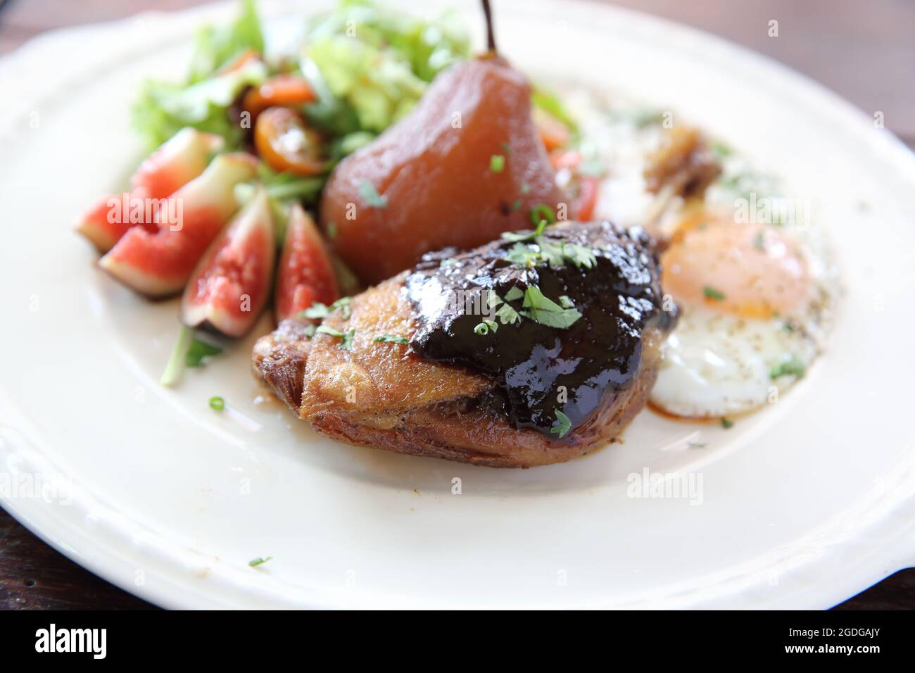 Duck confit , Roasted duck leg Stock Photo - Alamy
