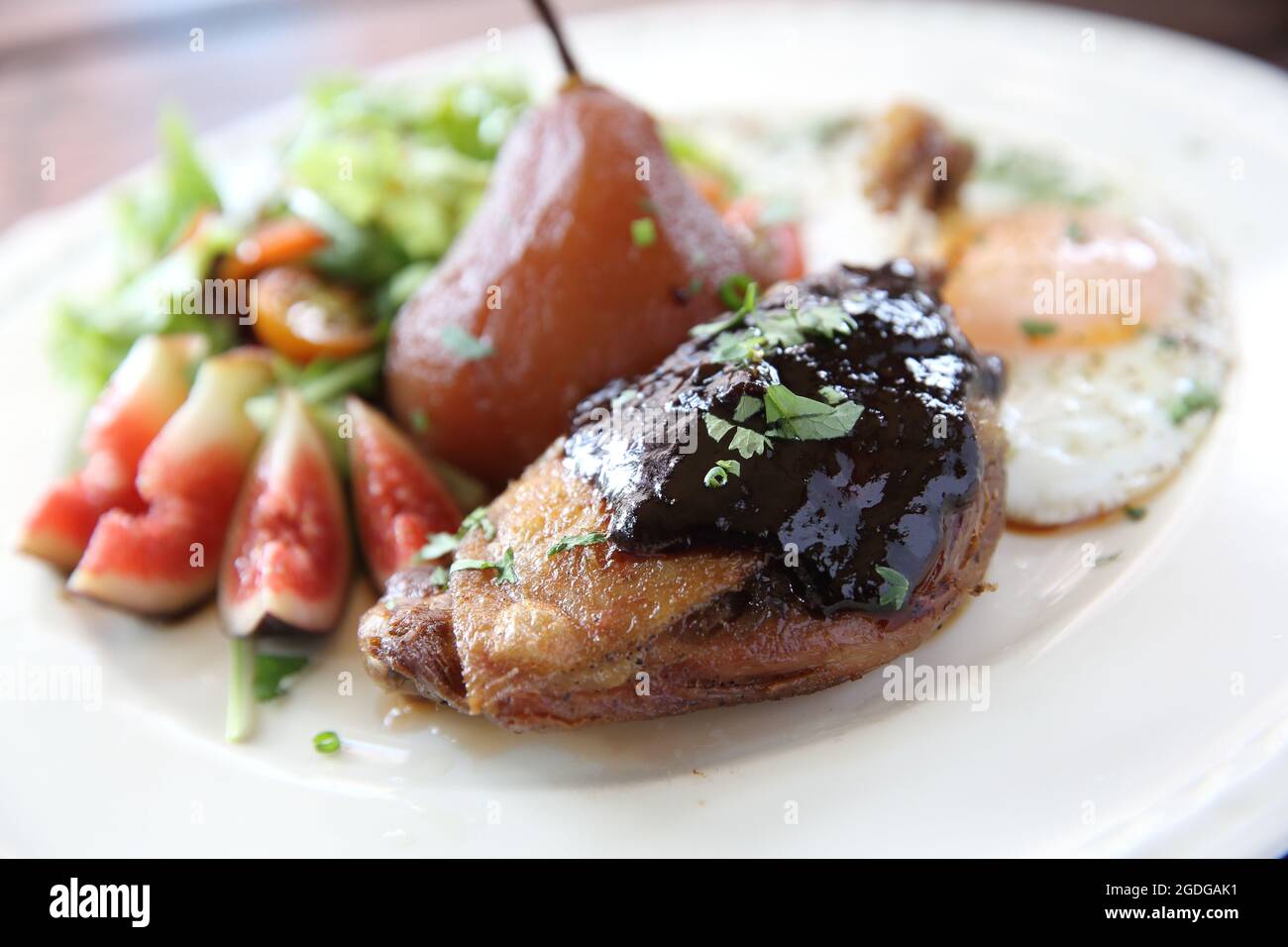 Duck confit , Roasted duck leg Stock Photo - Alamy