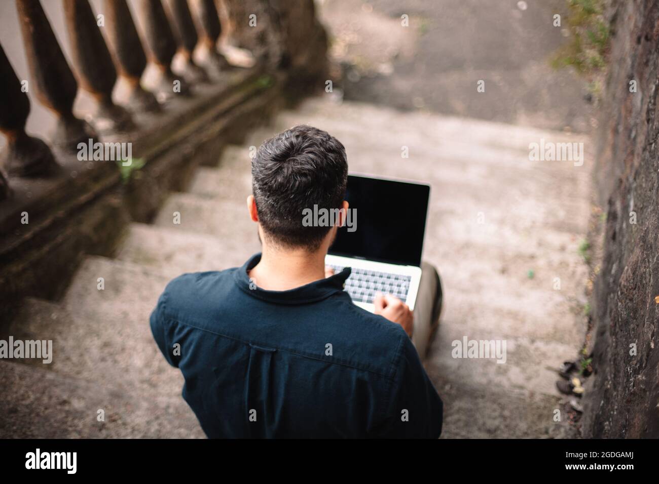 Man using computer back view hi-res stock photography and images - Alamy
