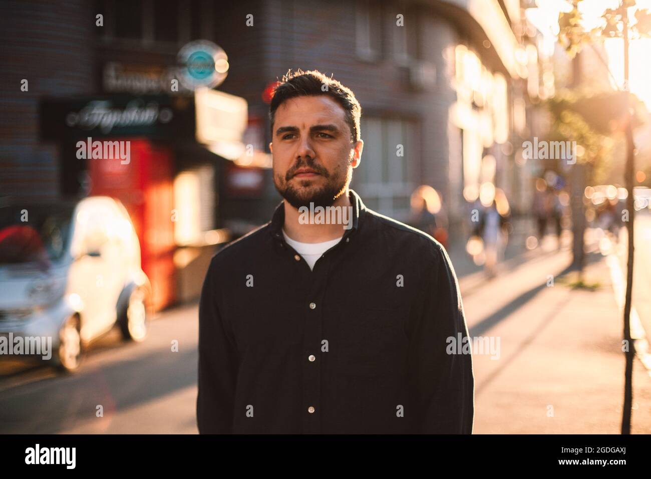 Sad man walking on street hi-res stock photography and images - Alamy